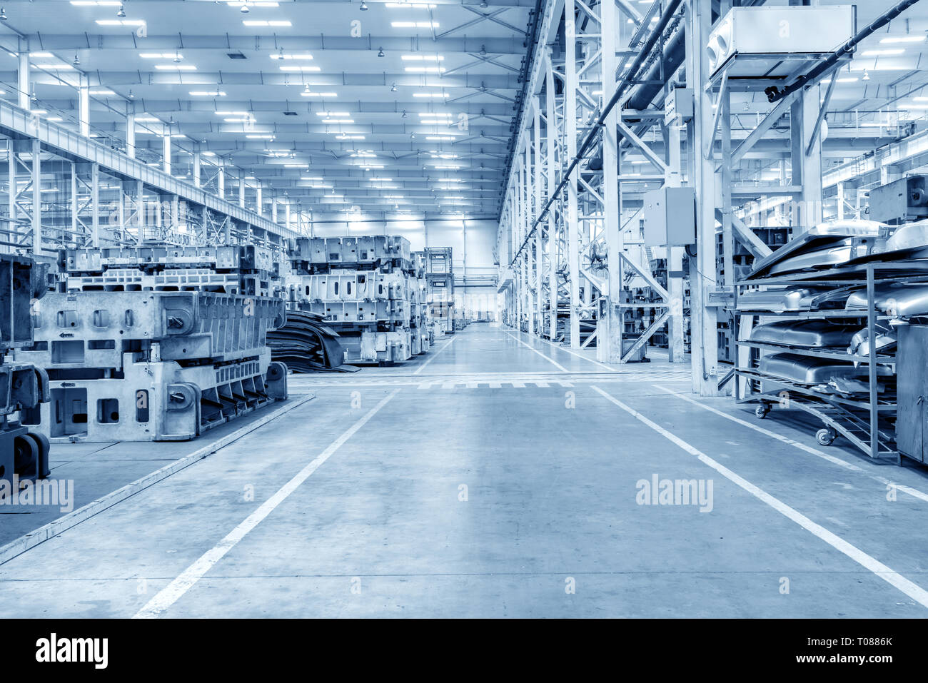 The interior of a big industrial building or factory with steel ...