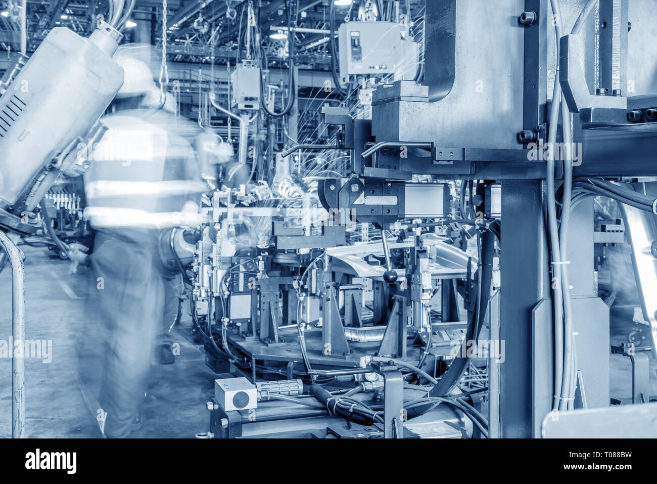 Car production line, skilled workers are working tense Stock Photo - Alamy