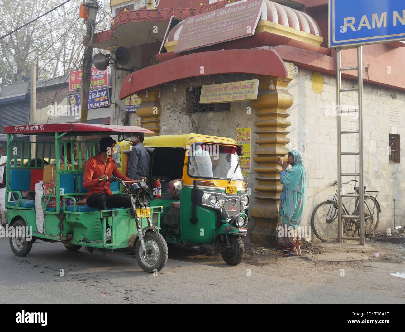 NEW DELHI, INDIA—MARCH 2018: Cycle rickshaw drivers wait for passengers ...
