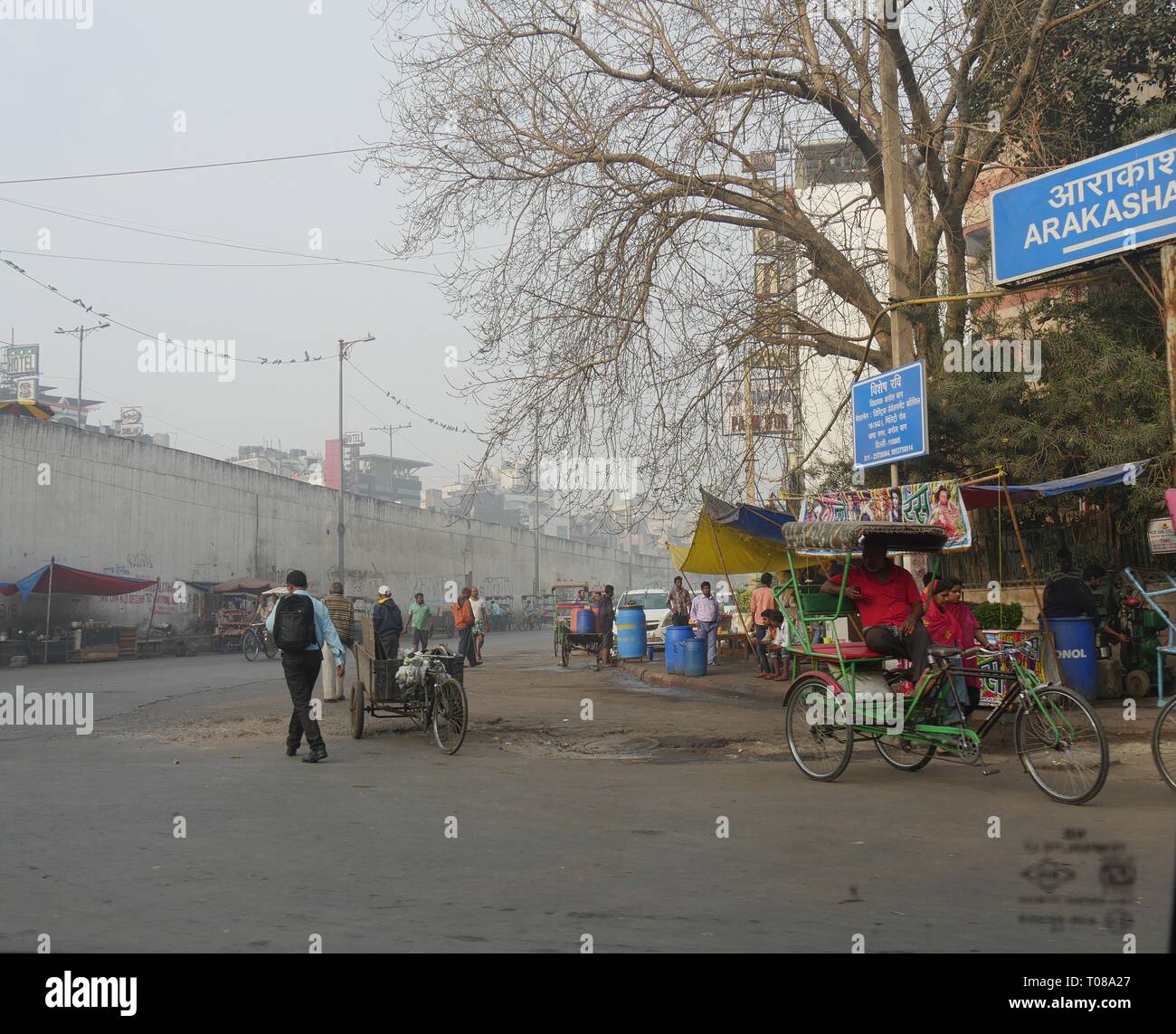 NEW DELHI, INDIA—MARCH 2018: A cycle rickshaw driver waits for ...