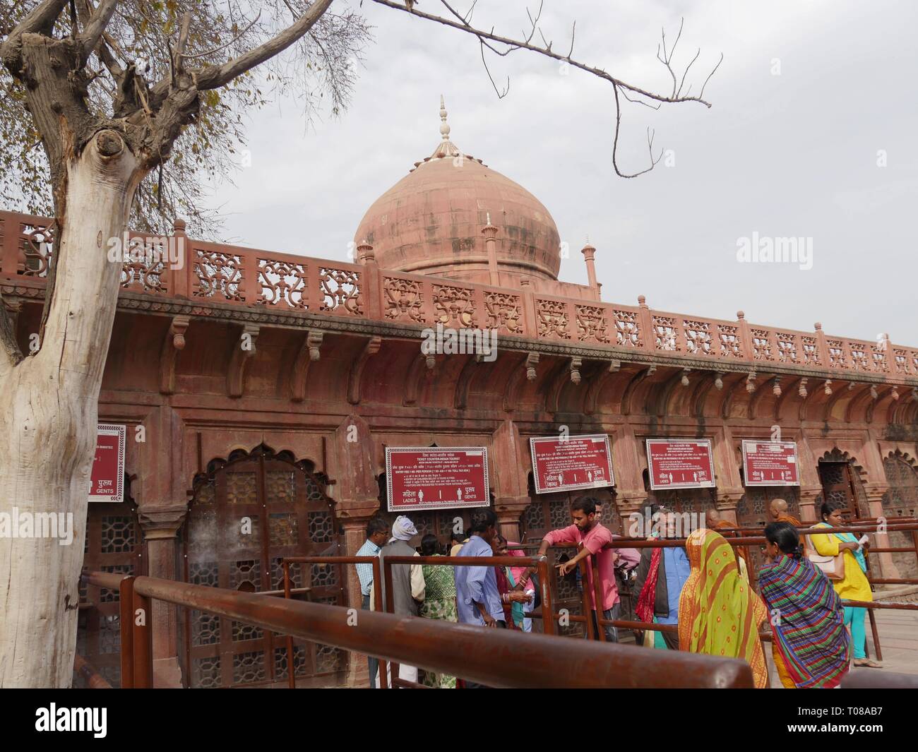 AGRA, UTTAR PRADESH, INDIA--MARCH 2018: Visitors fall in line to get ...