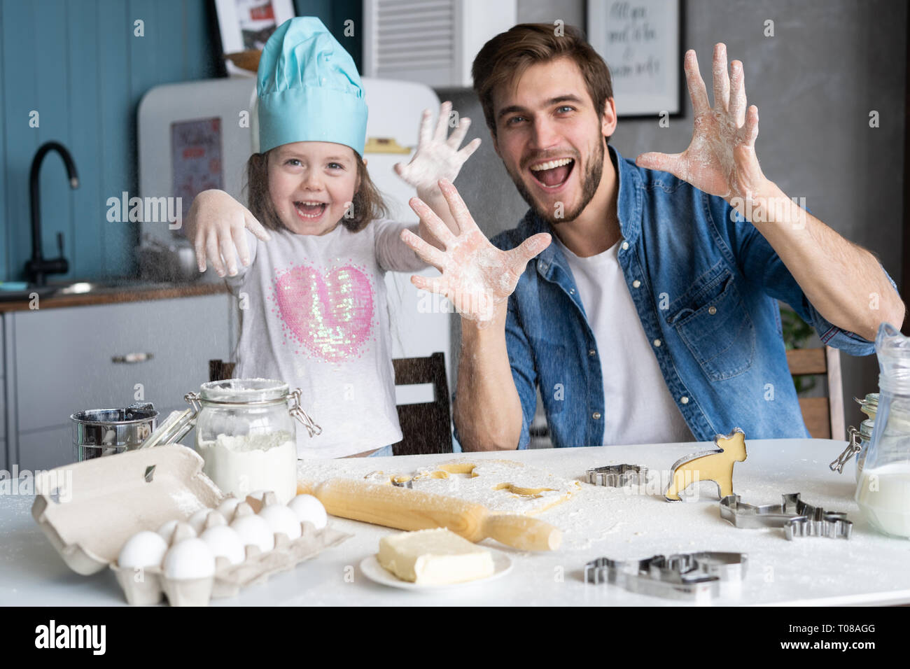 Family having fun cooking cookies hi-res stock photography and images ...