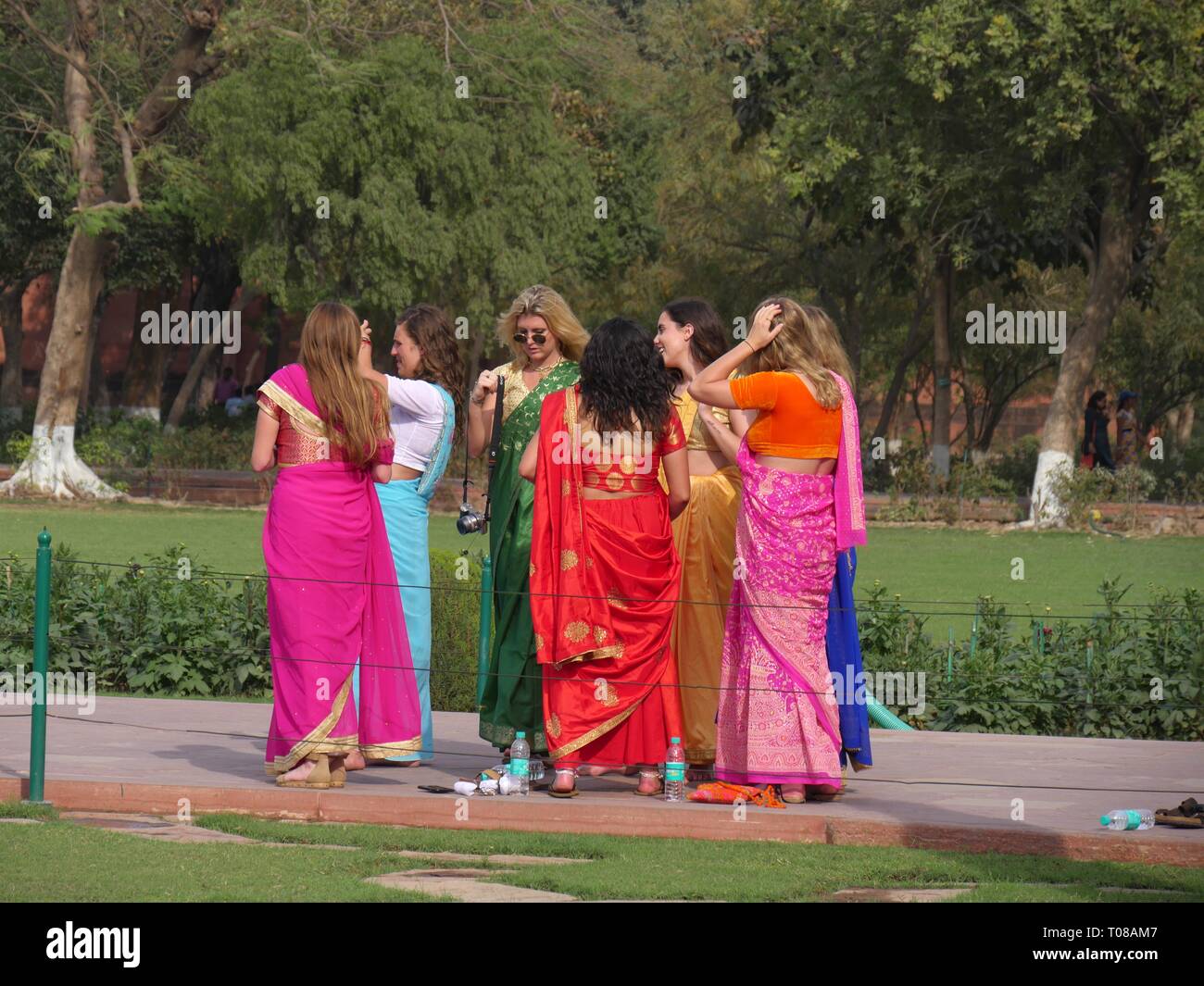 AGRA, UTTAR PRADESH, INDIA--MARCH 2018: A group of tourists wear ...