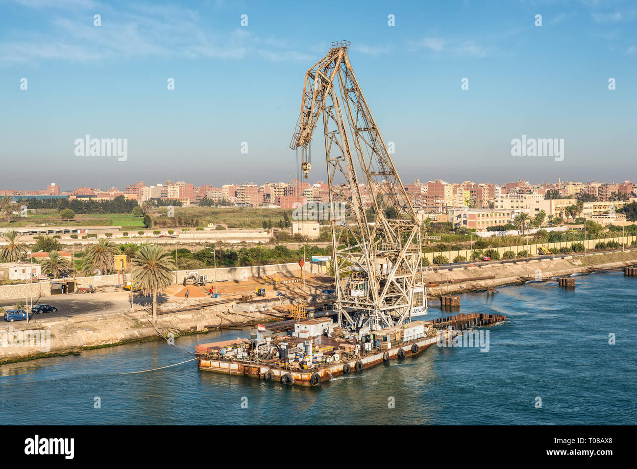 El Qantara, Egypt - November 5, 2017: Floating crane and wharves at the ...