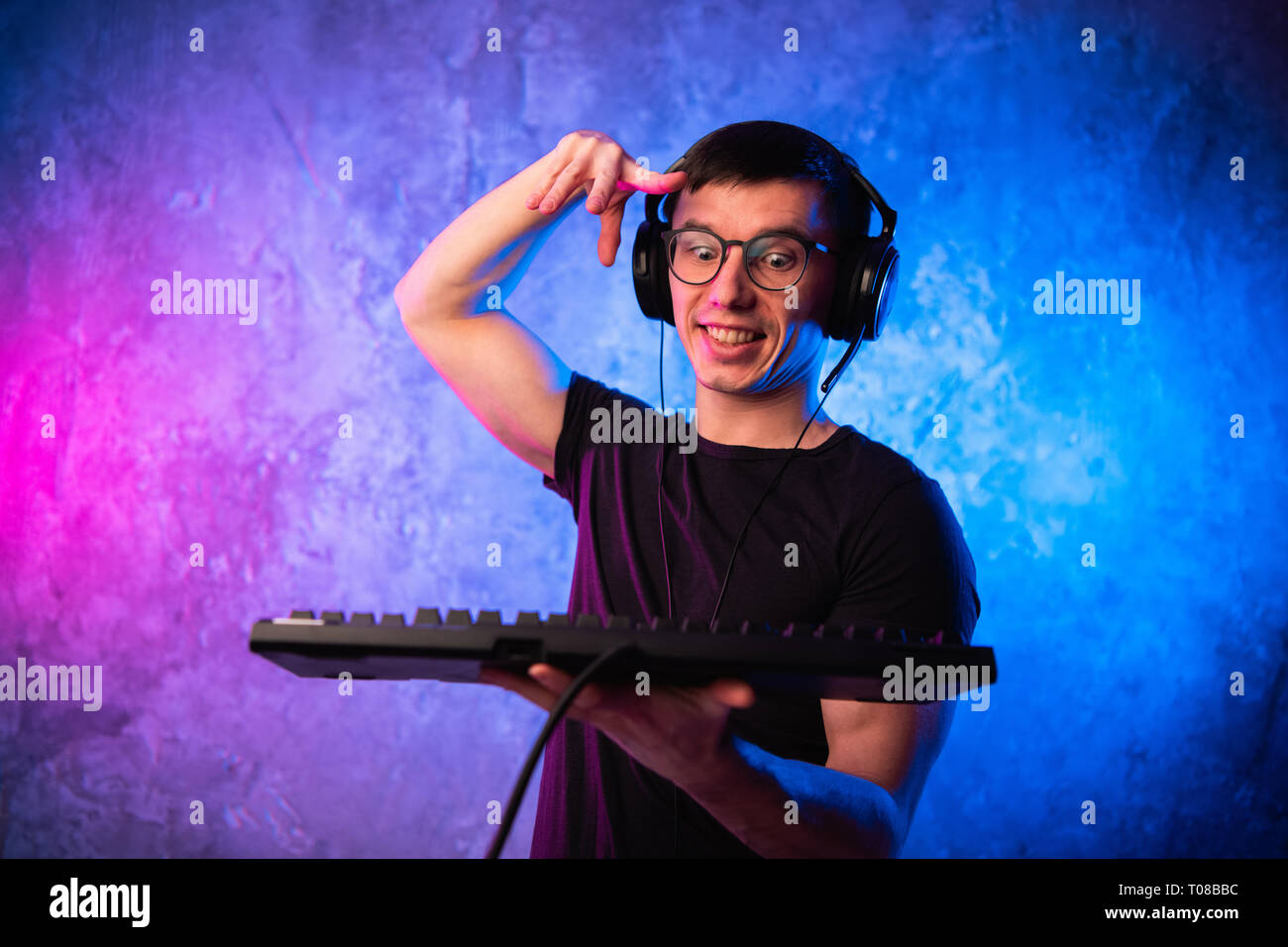 Portrait of funny nerd working on computer Stock Photo - Alamy