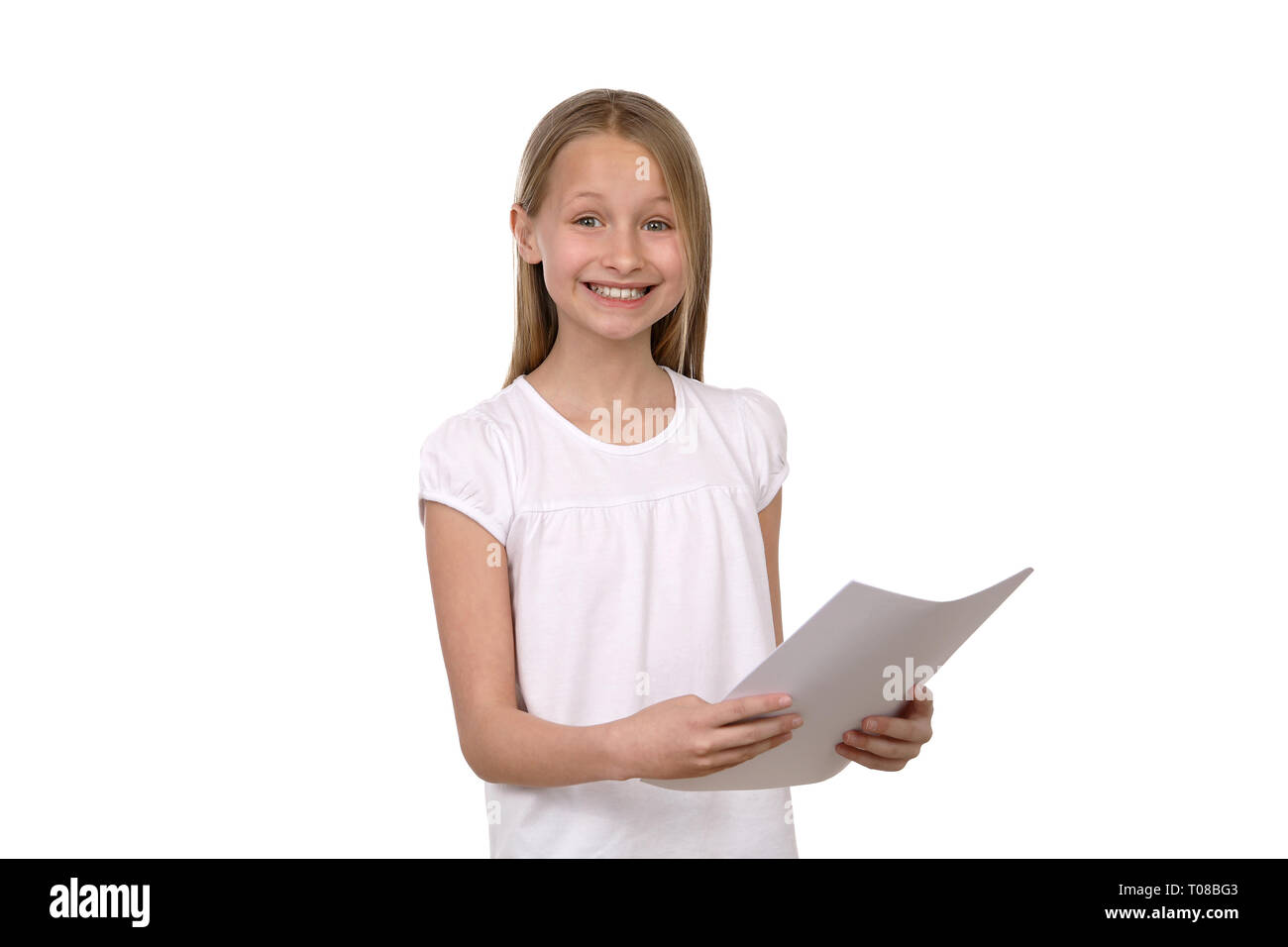 Girl holdes a sheet of paper in her hands and smiles Stock Photo - Alamy