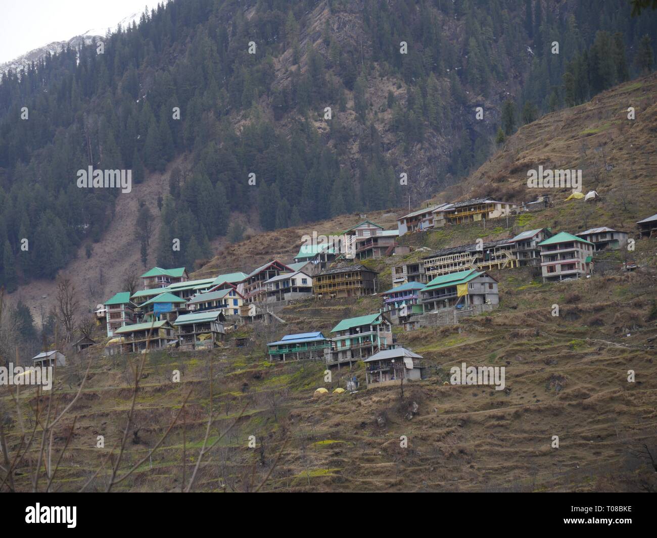 SOLANG VALLEY, HIMACHAL PRADESH—MARCH 2018: Houses on the hillside of ...