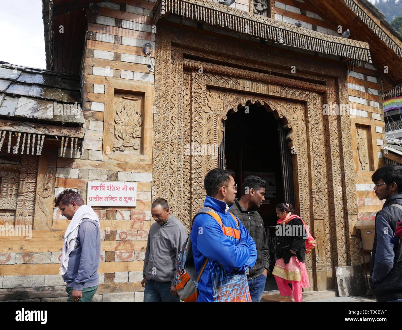 MANALI, HIMACHAL PRADESH, INDIA--MARCH 2018: People stand outside a ...
