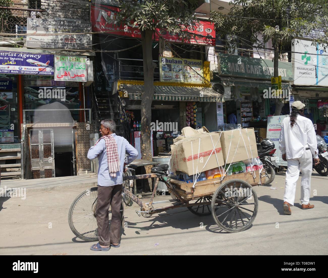 NEW DELHI, INDIA—MARCH 2018: A man stands by the roadside outside ...