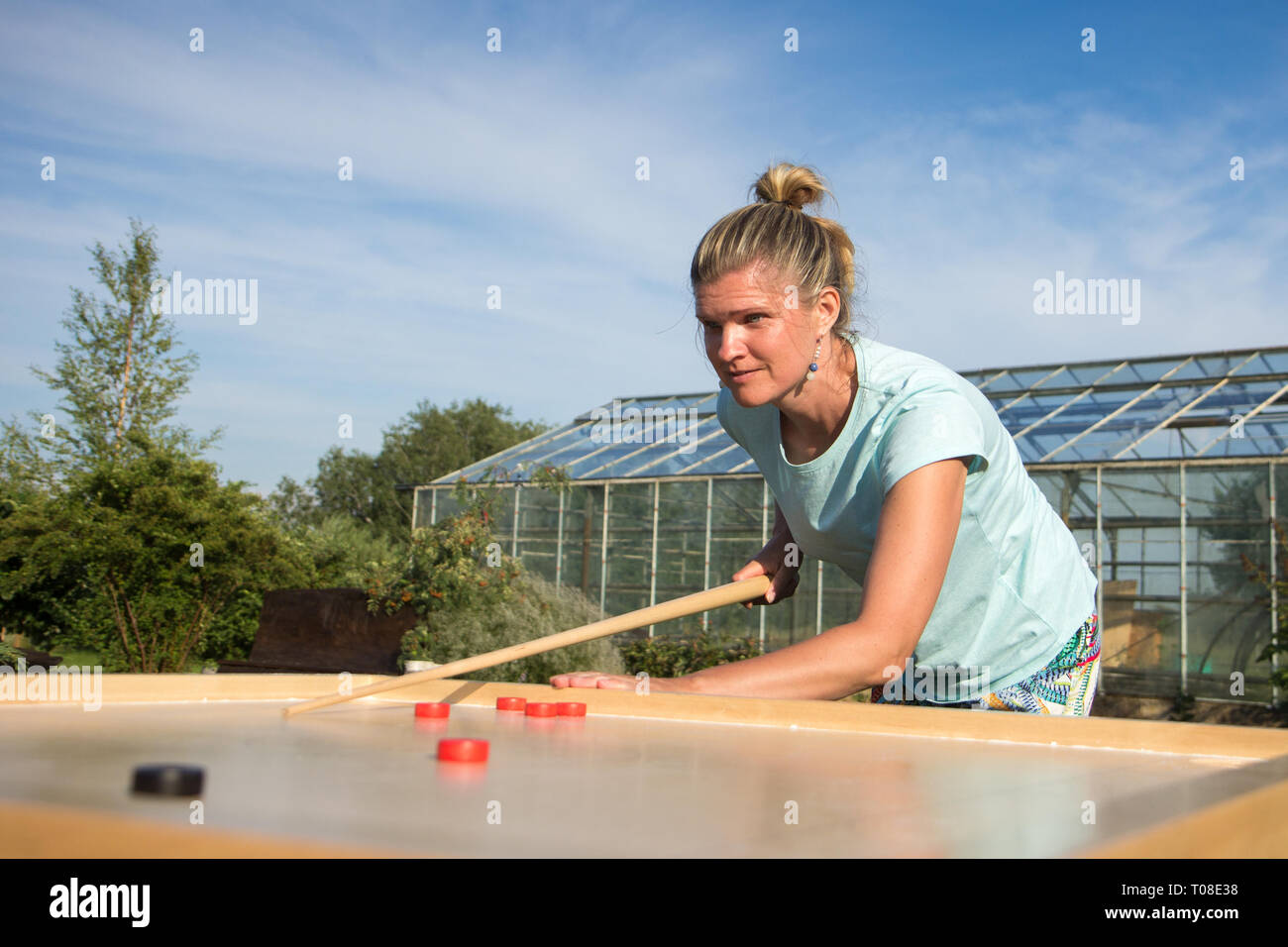 Women playing Novuss in outdoors Stock Photo - Alamy