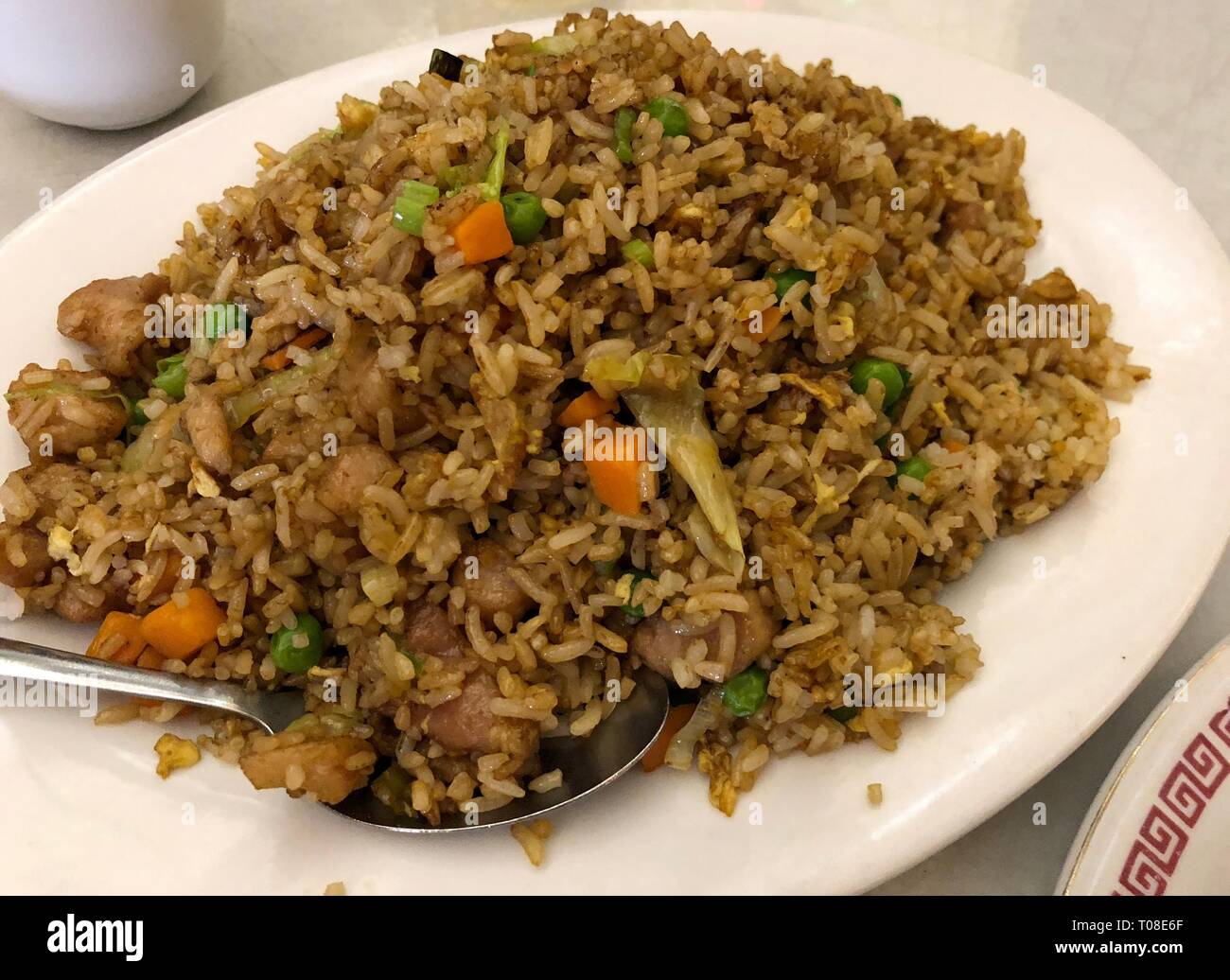 Plate full of chicken and vegetable fried rice Stock Photo - Alamy