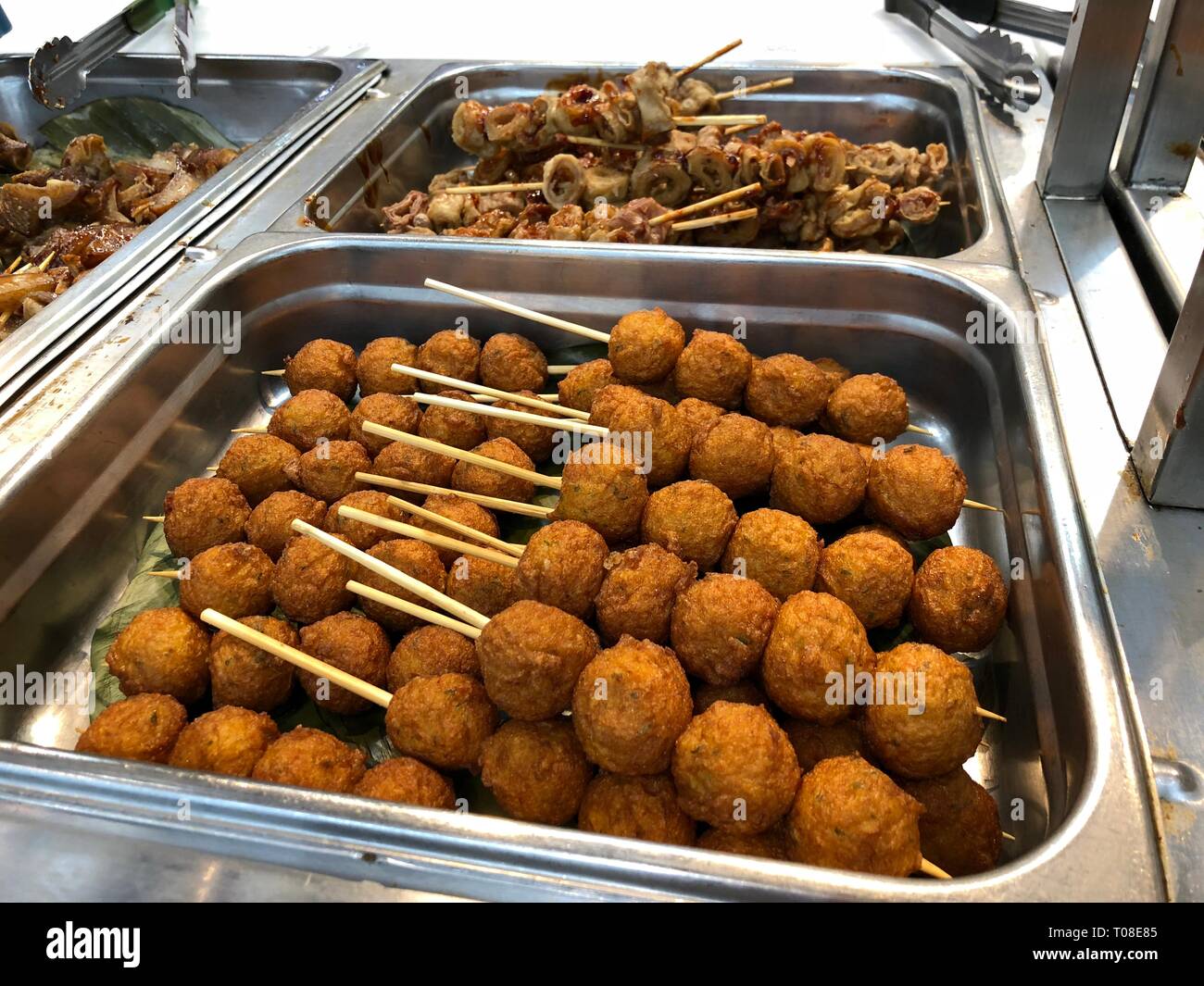 Fish balls and pork intestines in skewers, a very popular street food ...