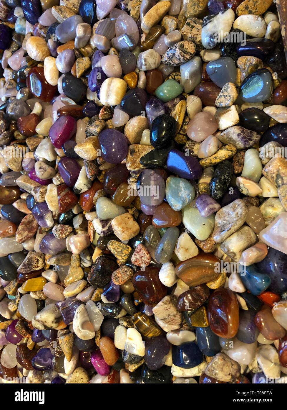 Portrait view of an assortment of colorful gemstones Stock Photo - Alamy
