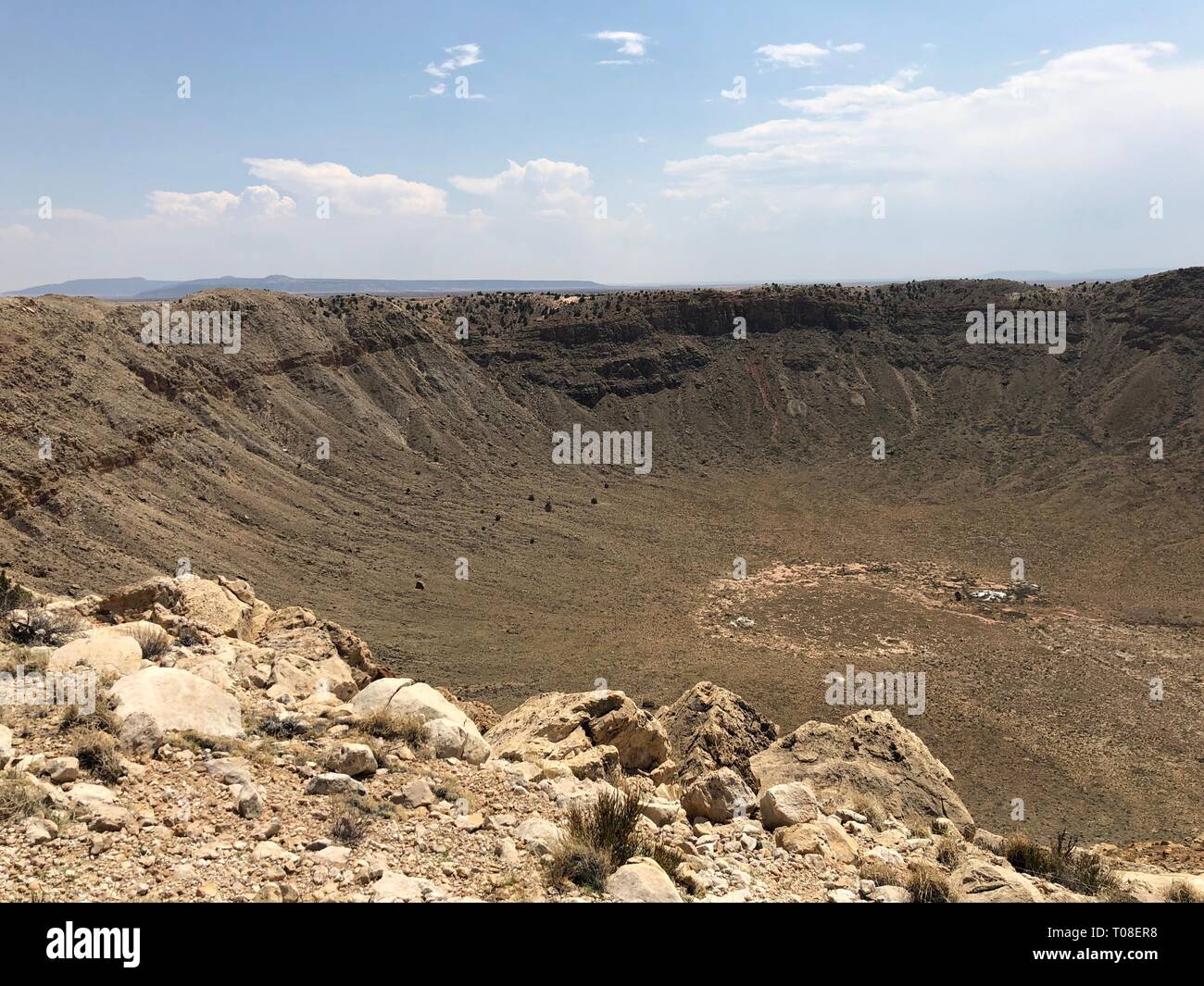 Medium wide shot of the Meteor Crater, one of the top attractions in ...