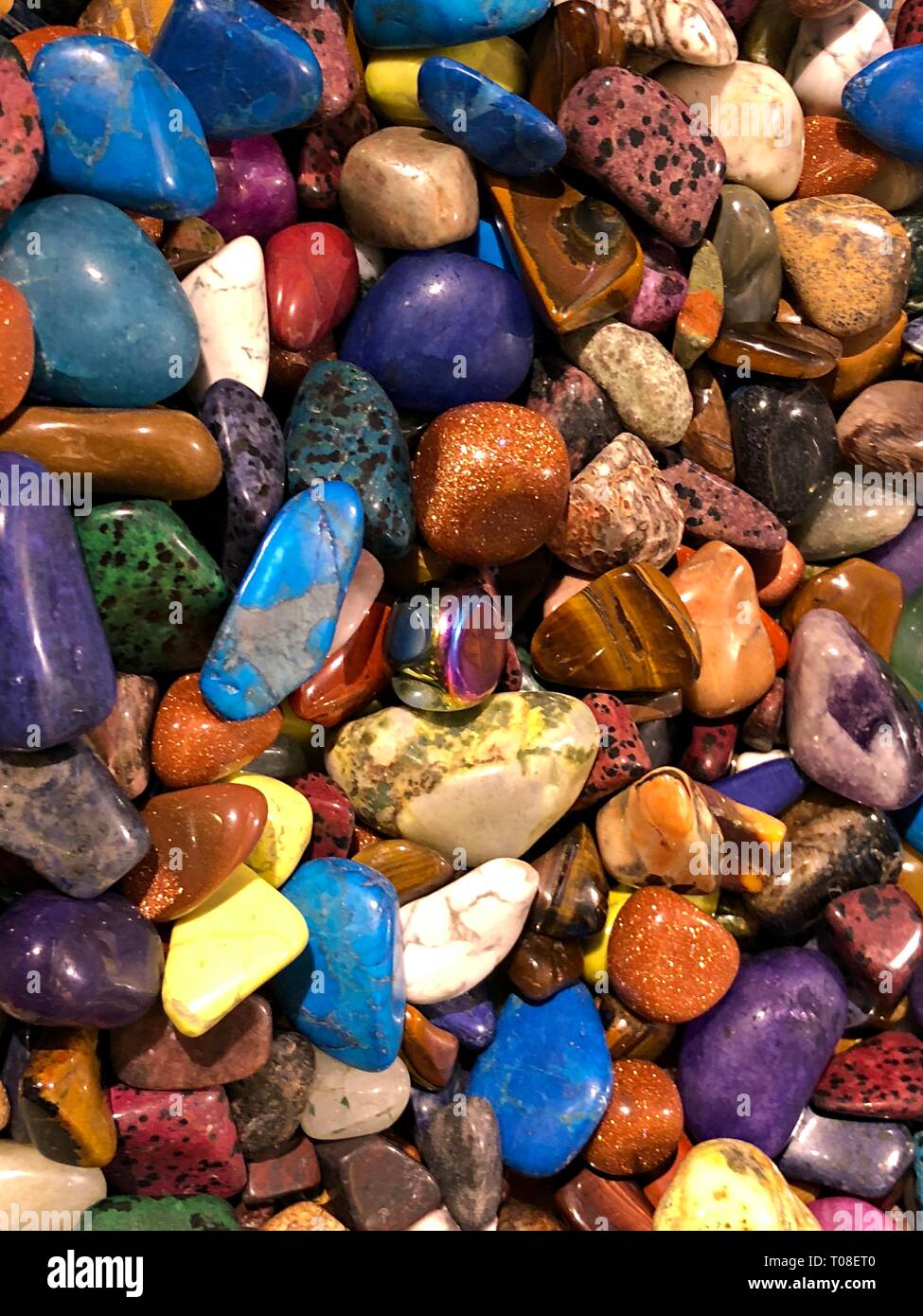 Close up of assorted mix of colorful rocks and gemstones Stock Photo ...