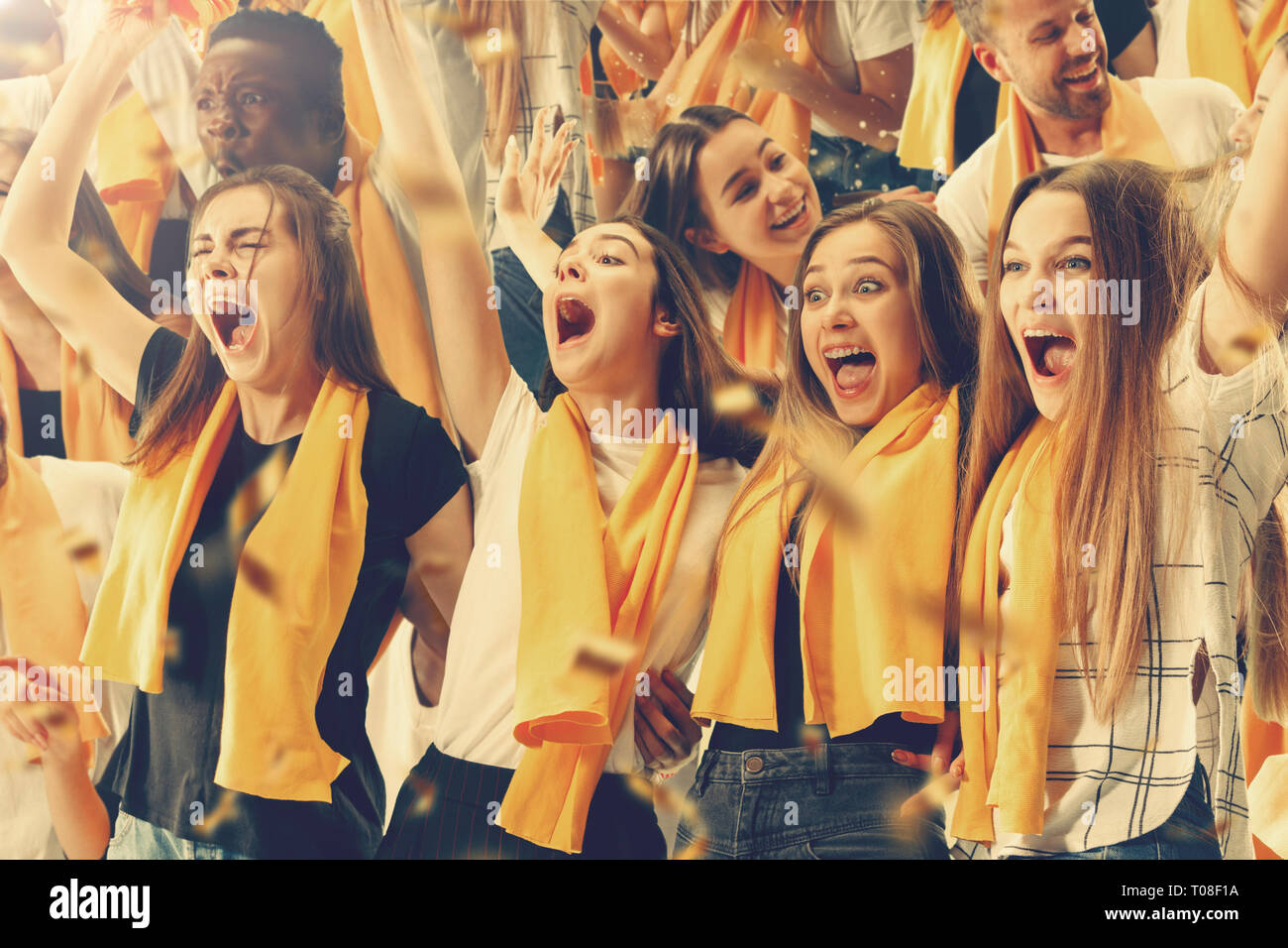 Group of happy fans are cheering for their team victory Stock Photo - Alamy