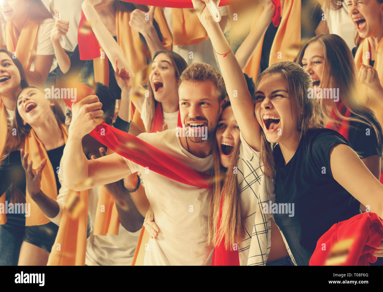 Group of happy fans are cheering for their team victory Stock Photo - Alamy