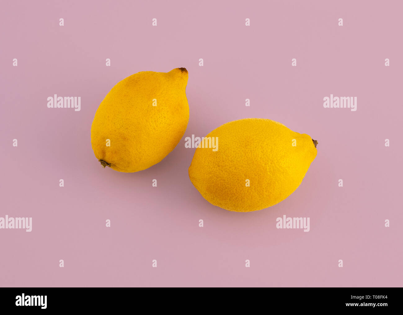 Lemon close ups with pastel colour backing Stock Photo - Alamy