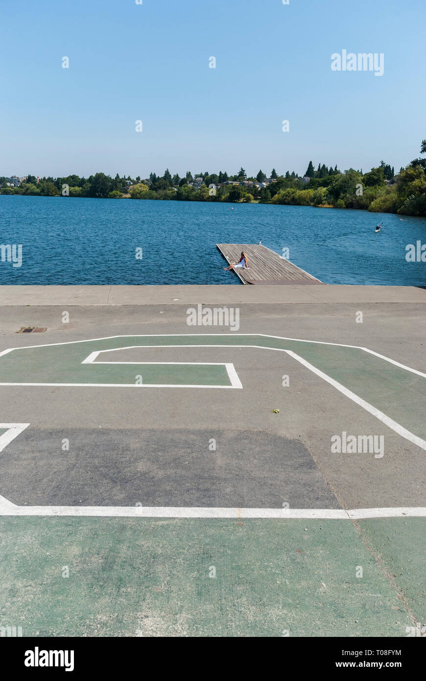 People sunbath on dock hi-res stock photography and images - Alamy