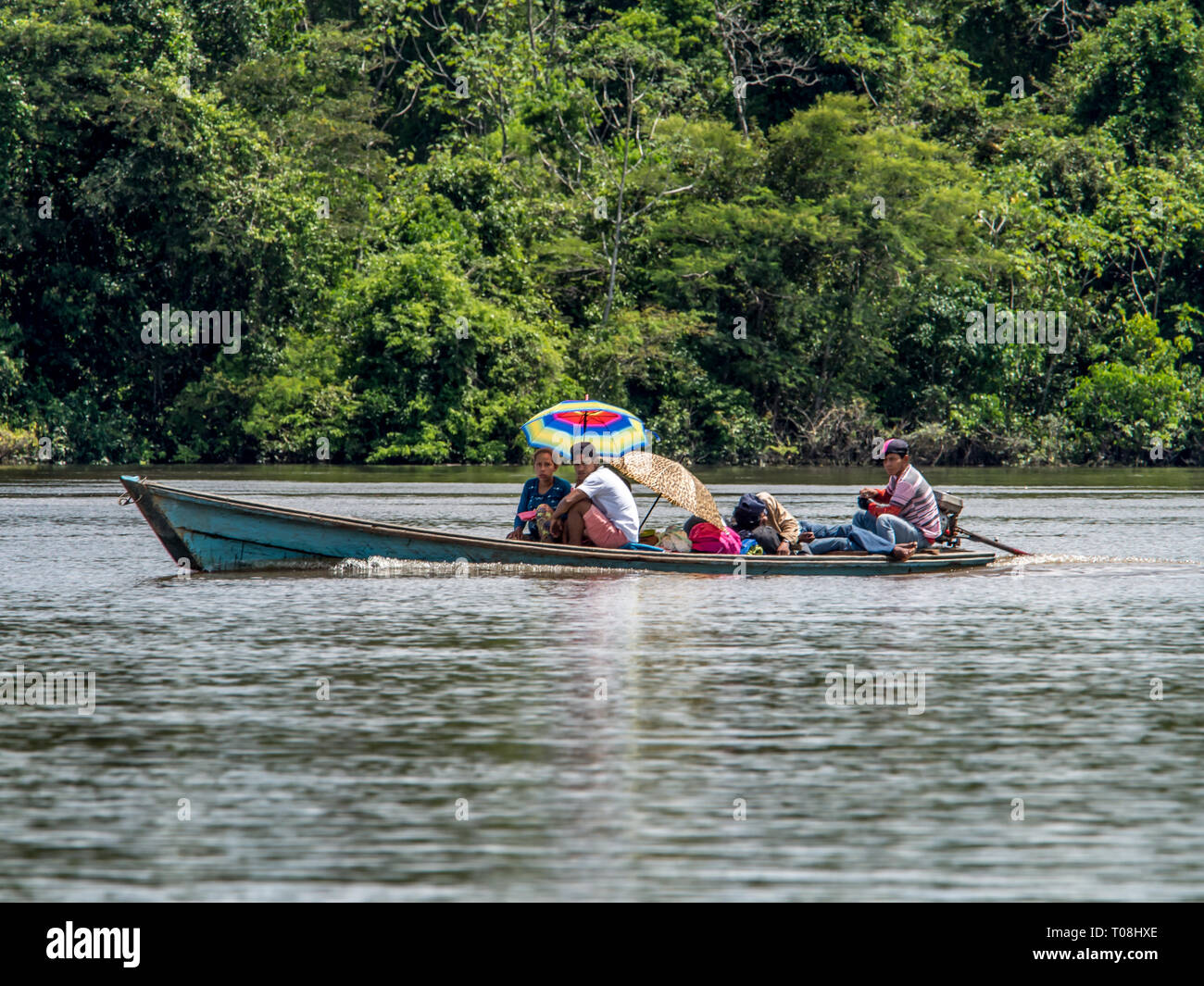 Amazon River, Brazil: - May 07, 2016: Small boat with locals on the ...