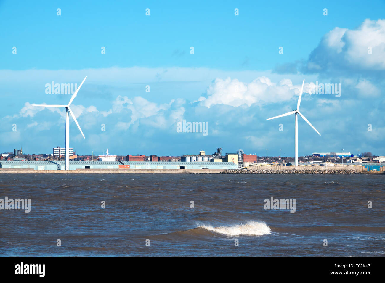 Wind turbines in Liverpool docks on the River Mersey Stock Photo - Alamy