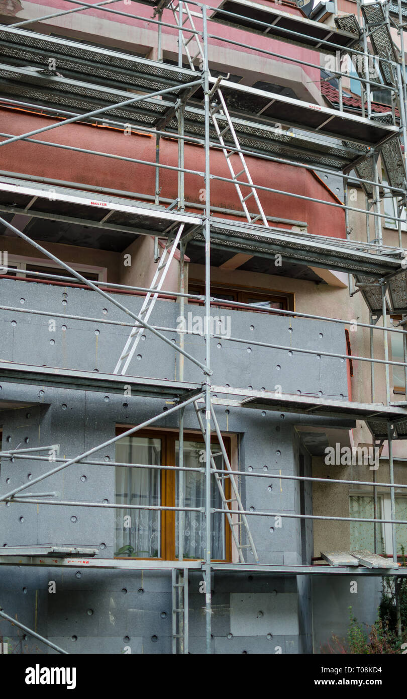 Building under reconstruction. wall insulation. metal structures for ...
