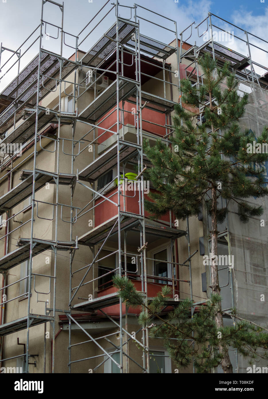 Building under reconstruction. wall insulation. metal structures for ...