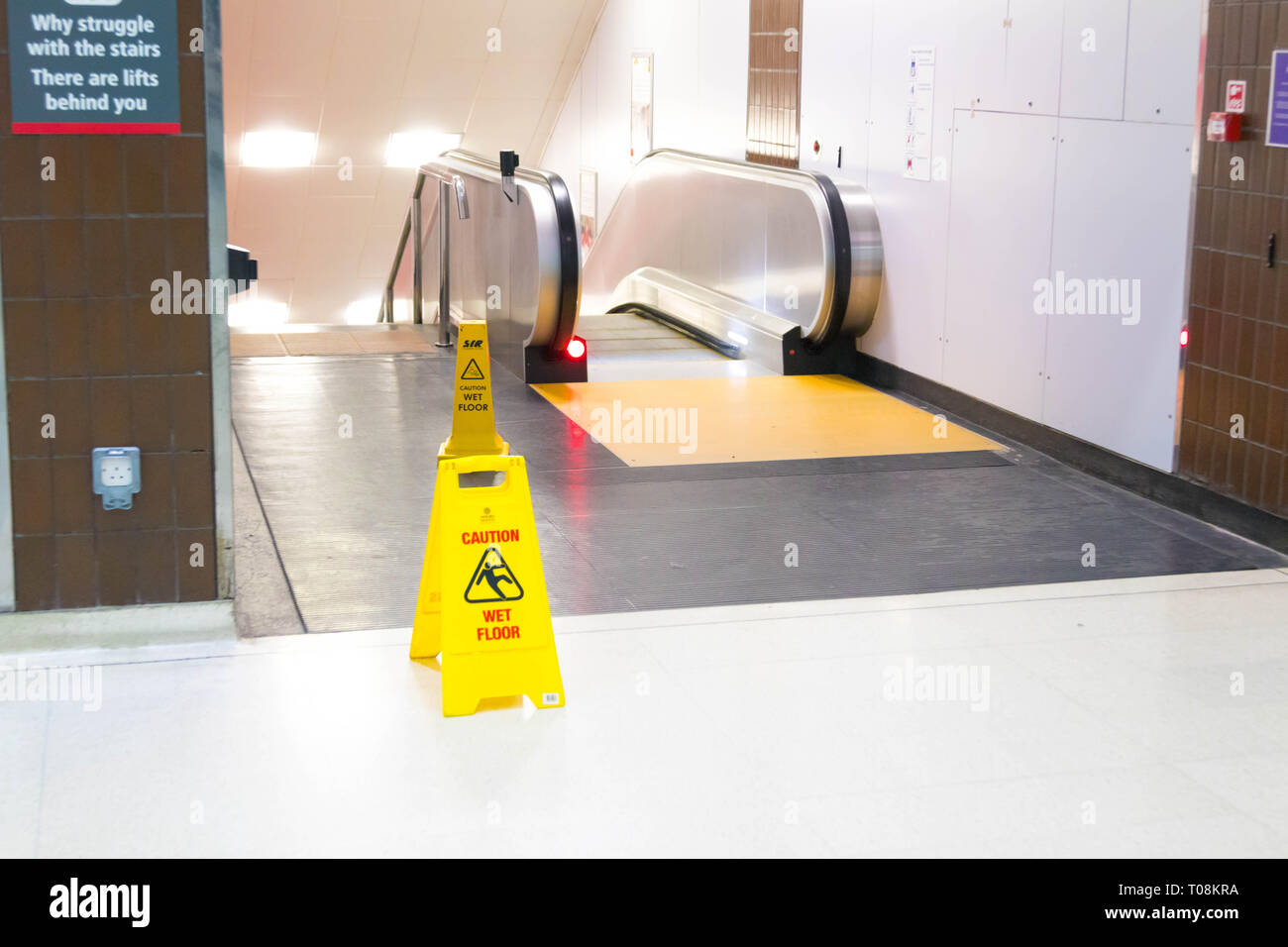 Warning stairs slippery wet sign hi-res stock photography and images ...
