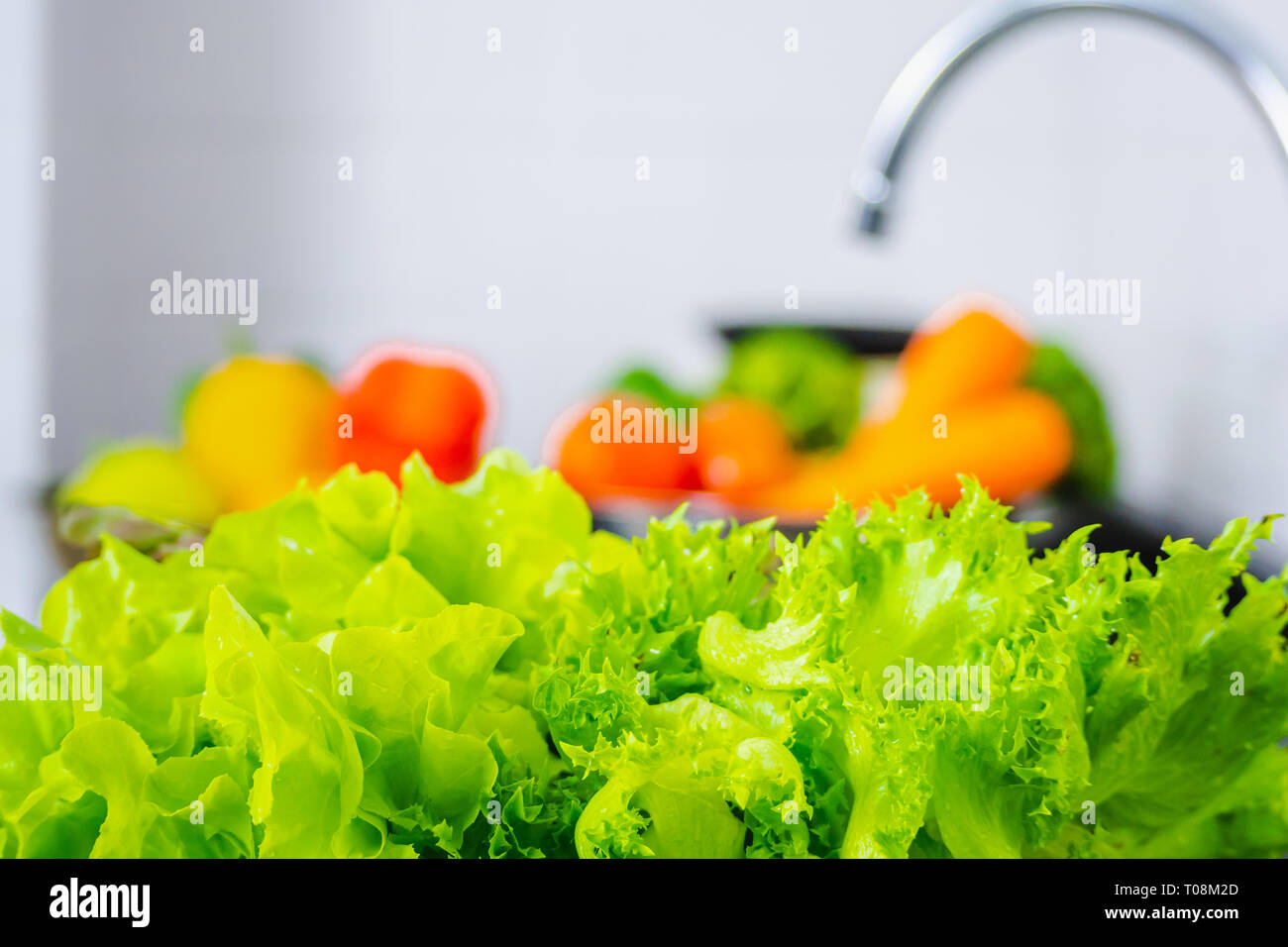 Preparing vegetable to washing to remove pesticides from skin Stock ...
