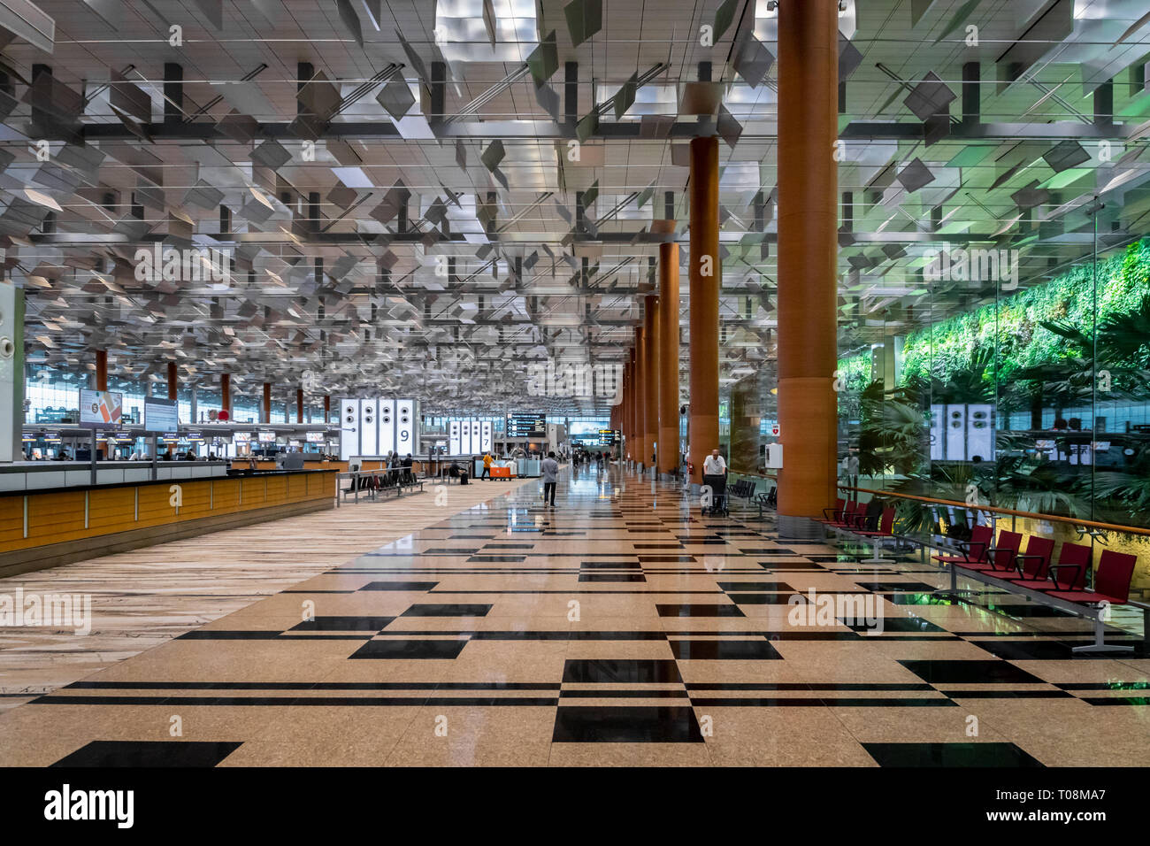 Singapore - January 2019: Singapore Changi Airport architecture and passengers. Singapore ...