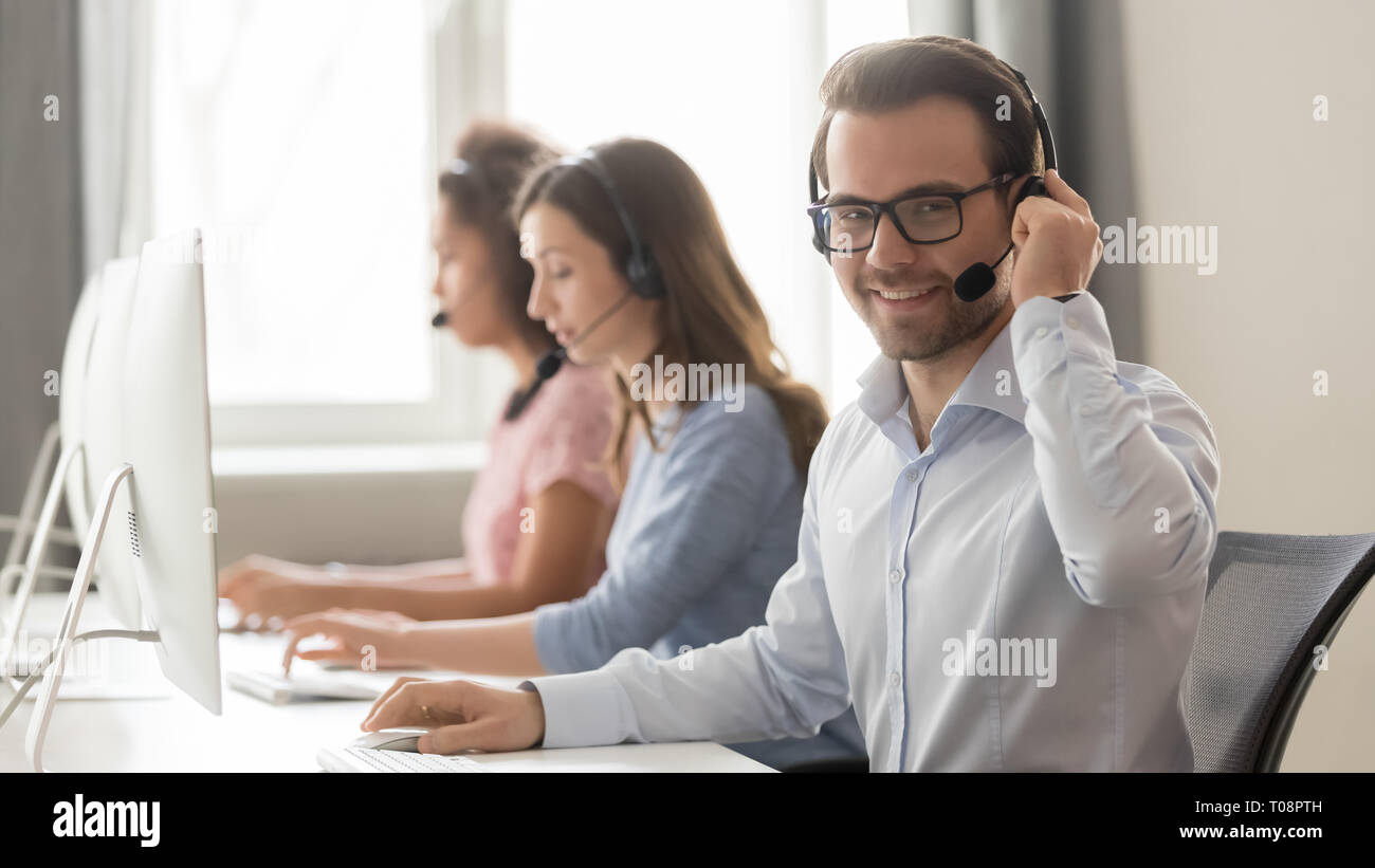 Customer service representative smiling camera hi-res stock photography ...