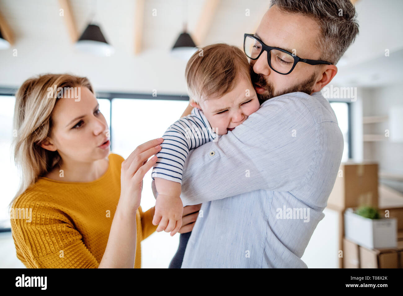 Father comforting crying daughter hi-res stock photography and images ...