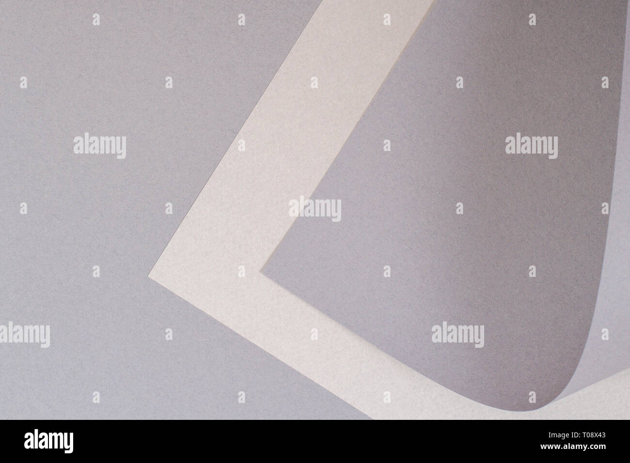 Abstract geometric shape gray color paper background Stock Photo - Alamy