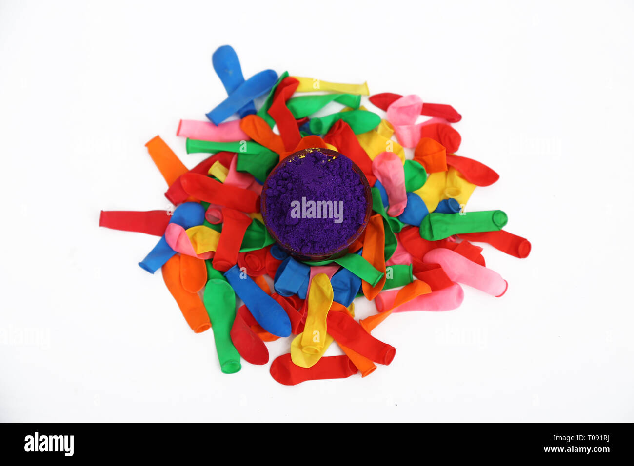 Portrait of purple color and many water balloons for holi festival ...