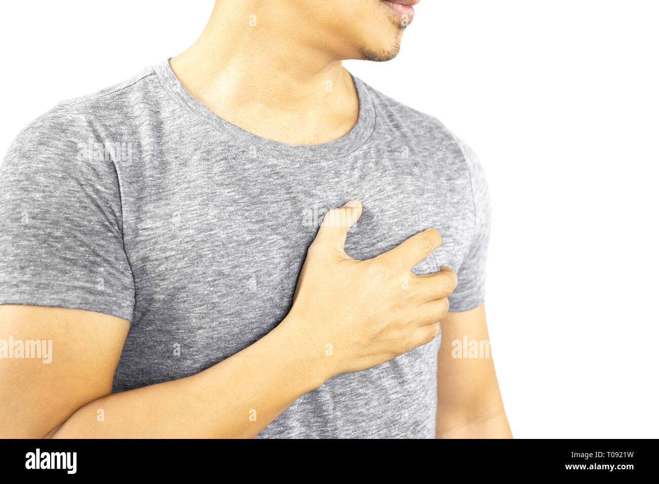 Man hand hold his chest having heart pain isolated in clipping path ...