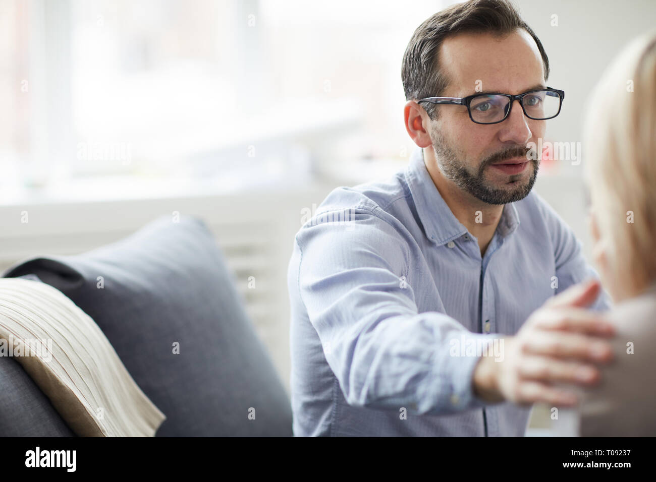 Human comforting hi-res stock photography and images - Alamy