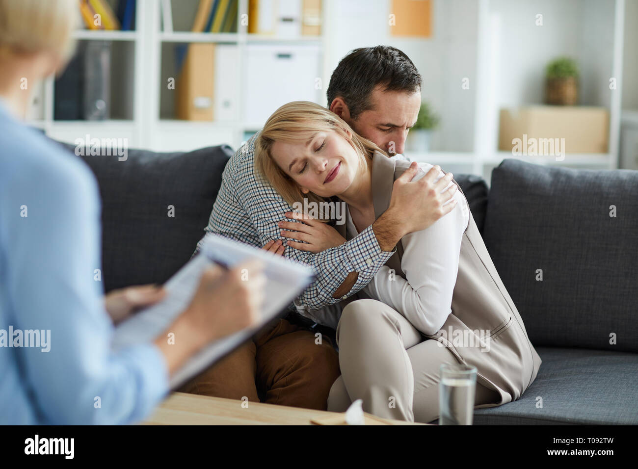 Couple in embrace Stock Photo - Alamy