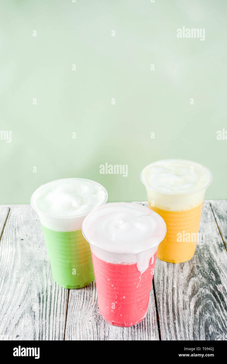 Summer colorful iced fog tea drinks, with tea, honey, matcha, lemonade ...