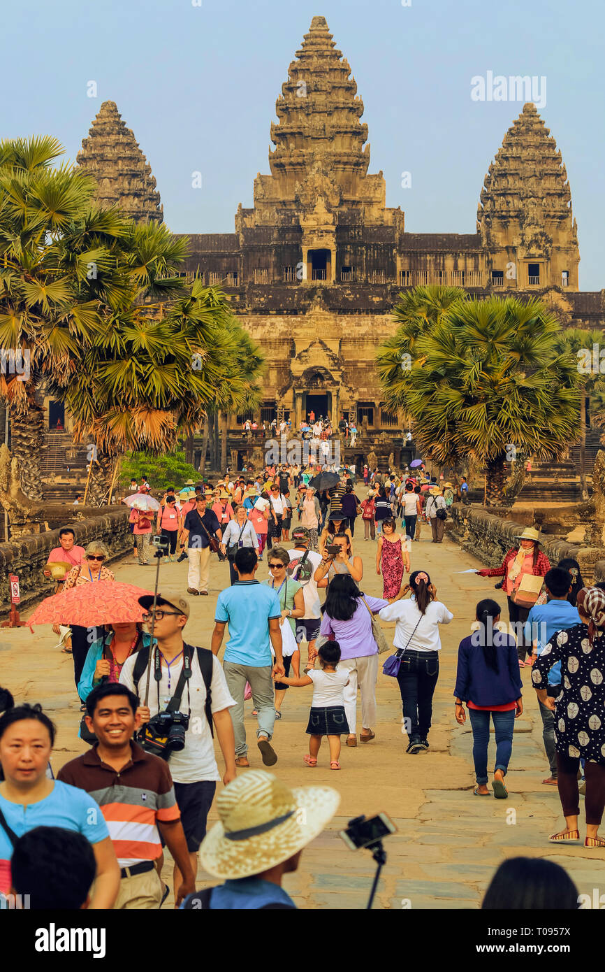Tourist crowds on the sandstone causeway entrance to famous 12thC ...