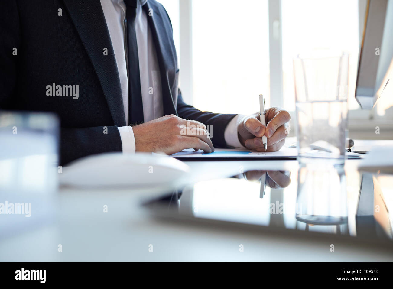 Making notes on paper Stock Photo - Alamy