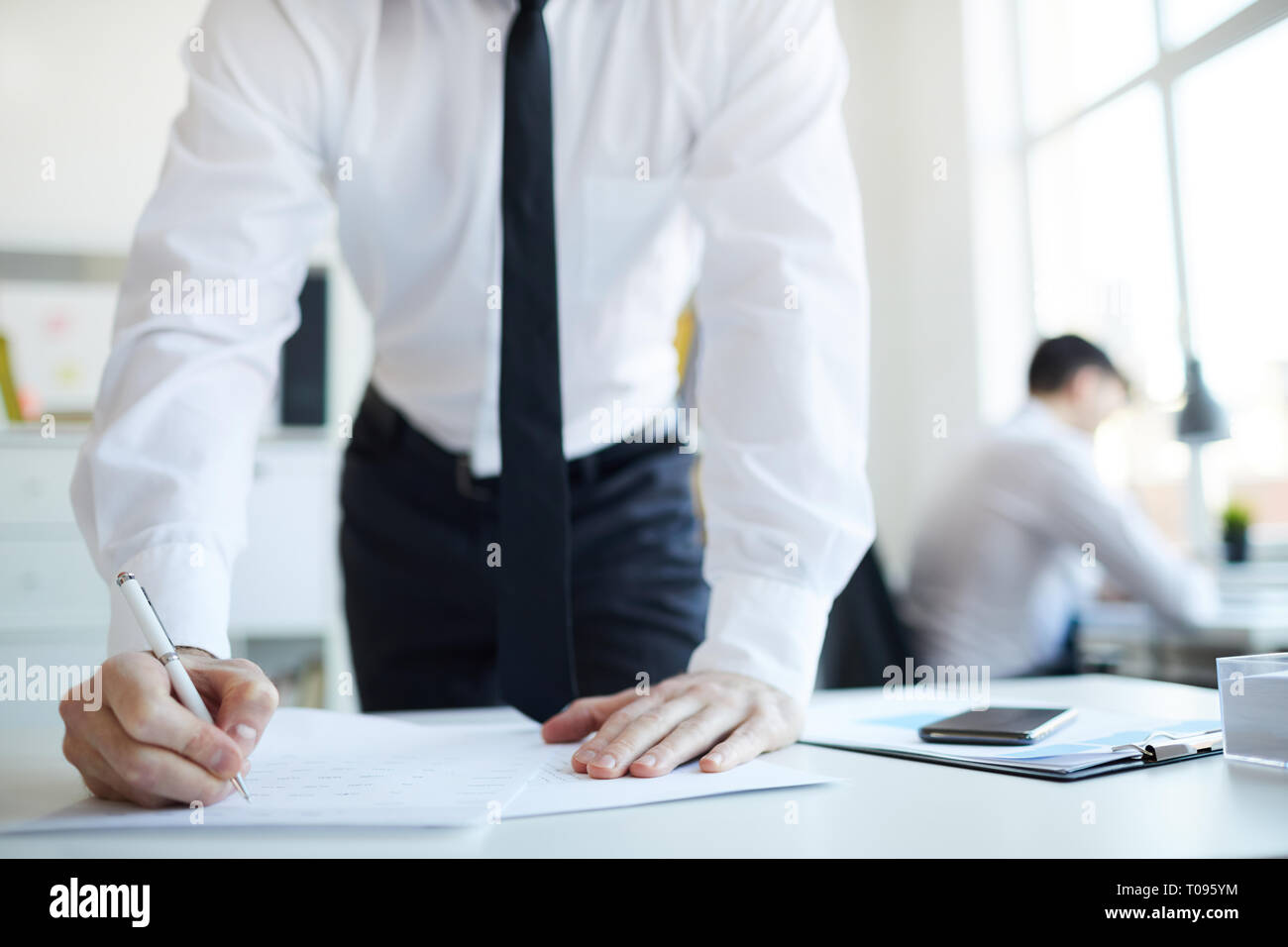 Signature in contract Stock Photo - Alamy