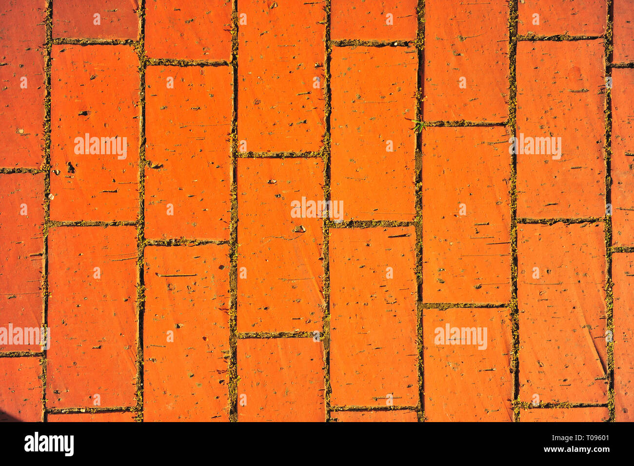 Orange brick tiled floor abstract background Stock Photo - Alamy