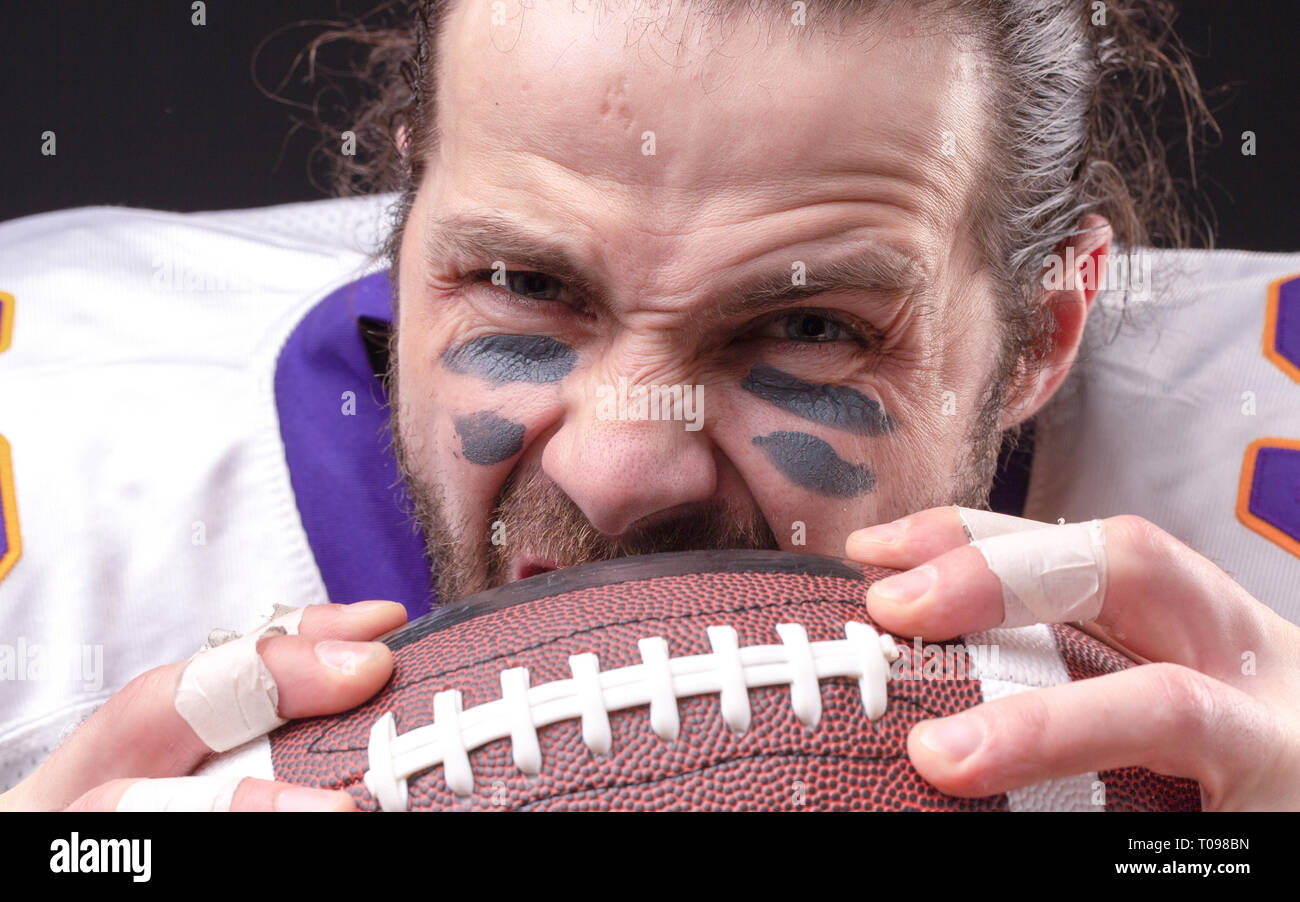 Aggressive american football player hi-res stock photography and images ...