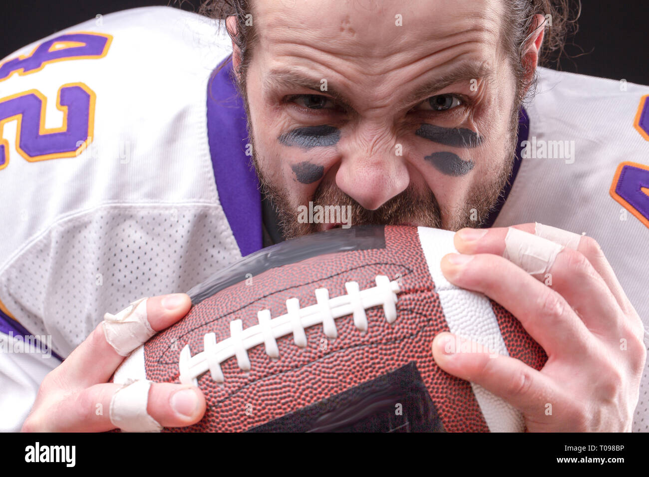 Aggressive american football player hi-res stock photography and images ...