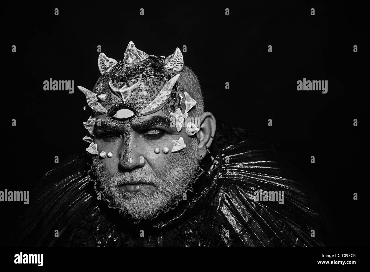 Alien, demon, sorcerer makeup. Man with third eye, thorns or warts ...