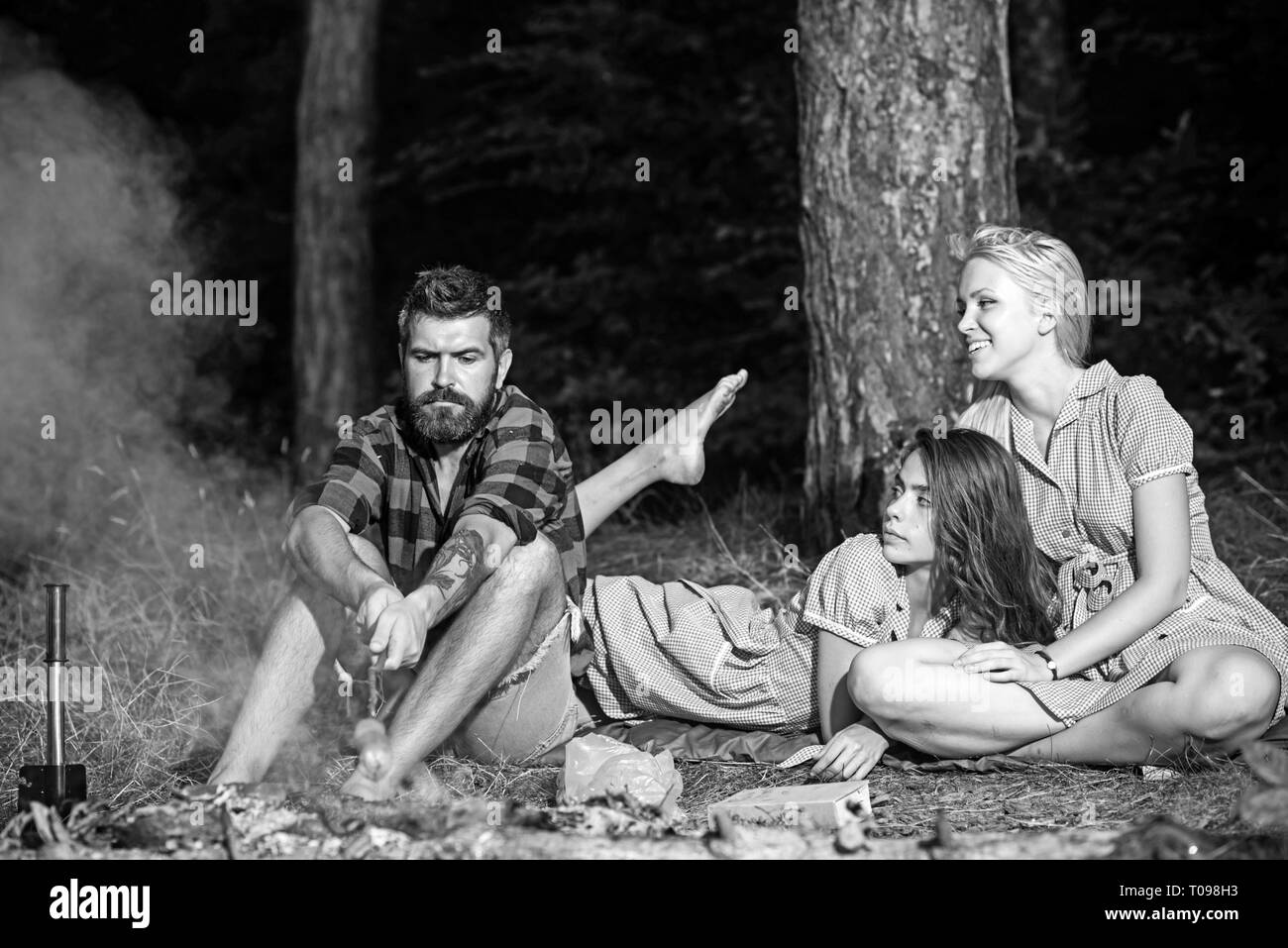Bonfire, man and woman Black and White Stock Photos & Images - Alamy