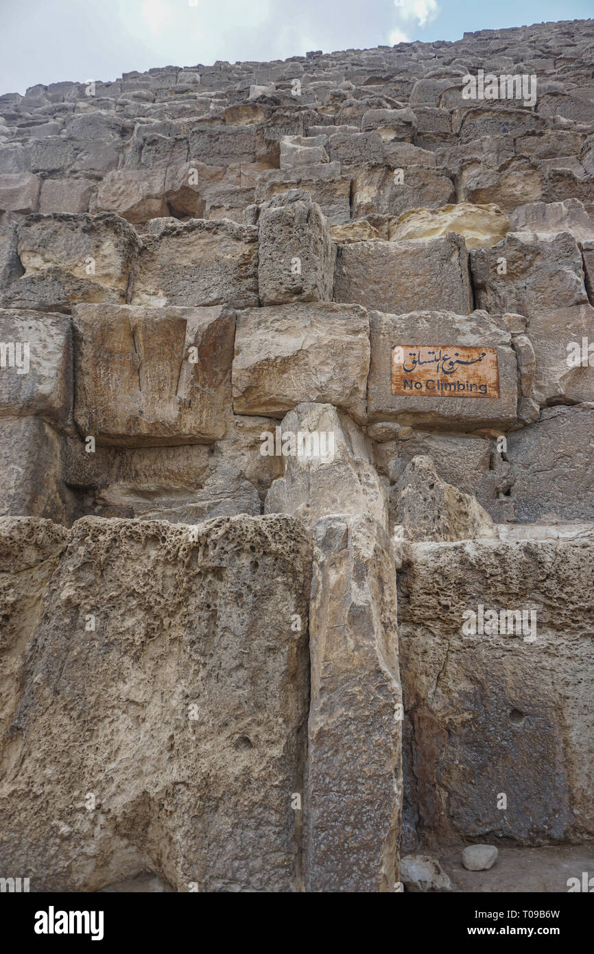 Giza, Egypt: A sign in Arabic and English at the Khufu pyramid complex ...