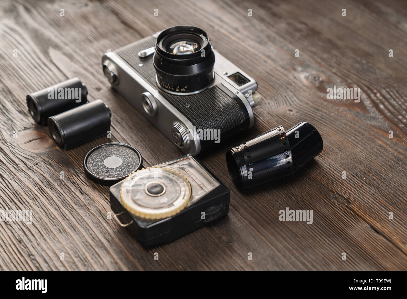 Set of vintage photography objects â€“ camera, film, and light meter ...