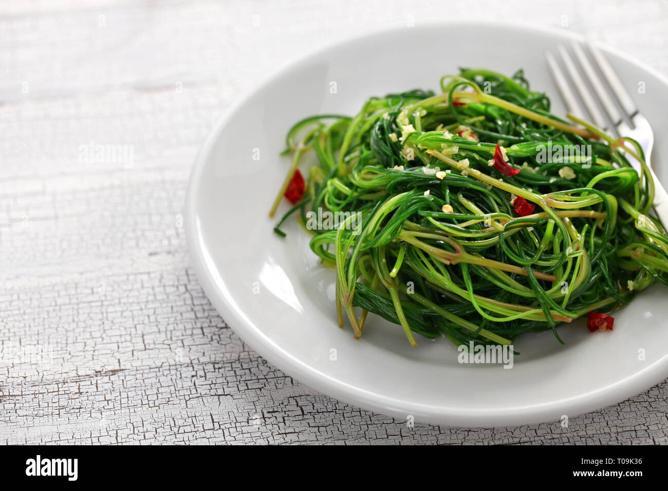 sauteed agretti, italian food Stock Photo - Alamy