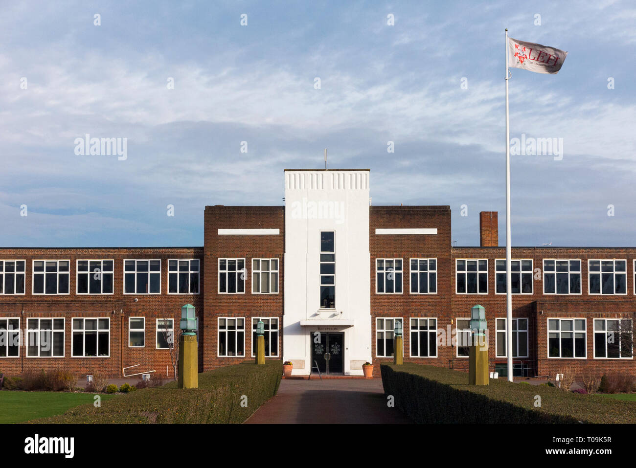 Flag flying school building entrance hi-res stock photography and ...